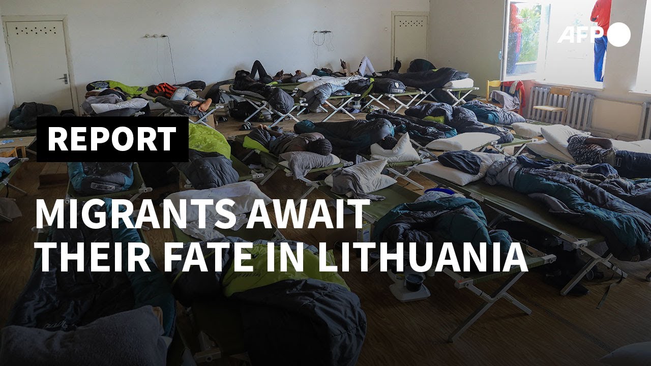 Migrants await their fate as tensions mount in Lithuania | AFP - YouTube