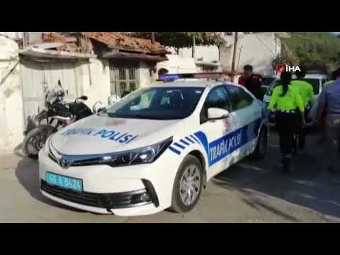 Polis memuru araç kaportasında metrelerce sürüklendi