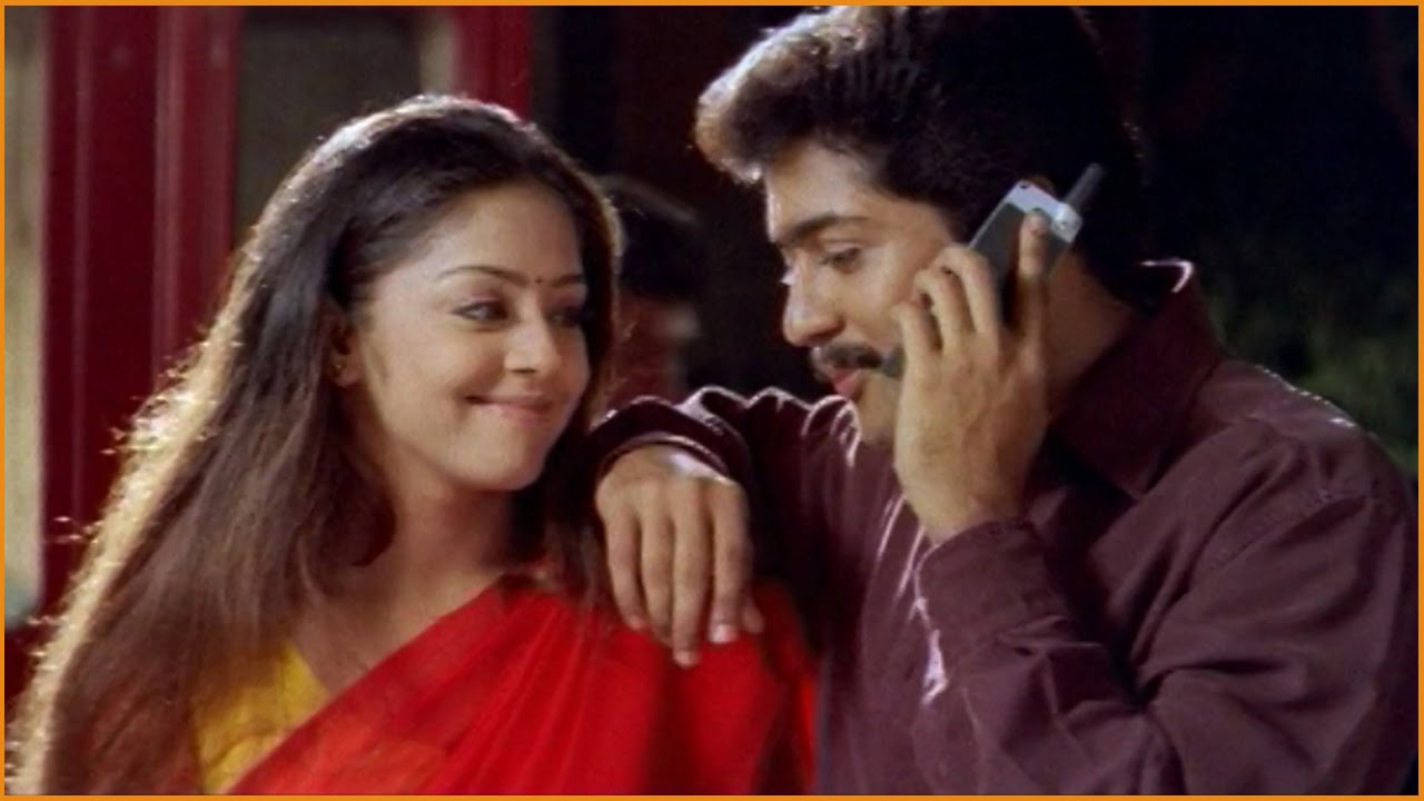 Poratam Movie || Suriya & Jyothika Watching Movie Scene ...
