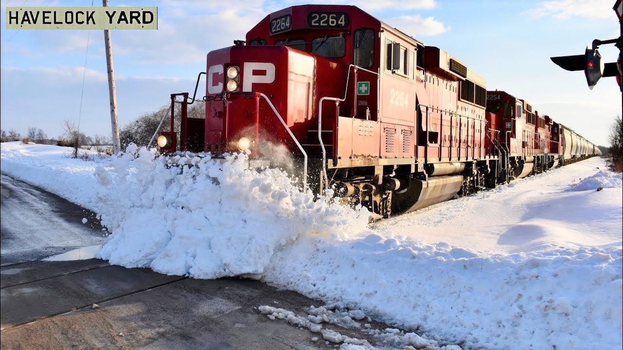 Plowing Snow with a Train - YouTube