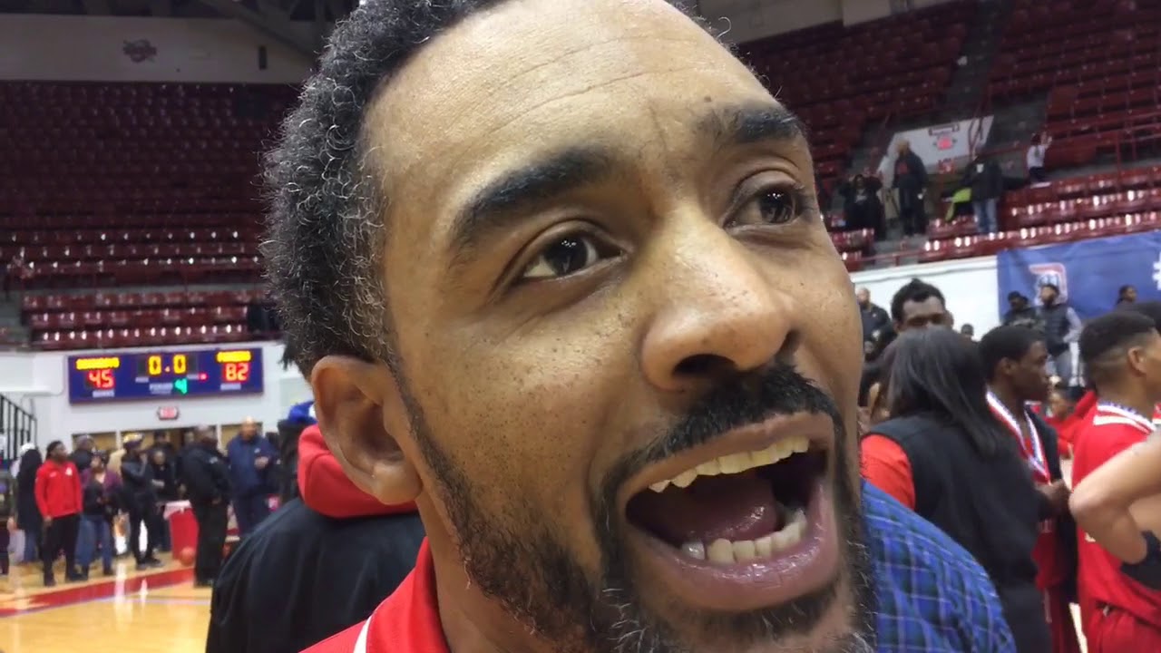 Detroit Edison senior PJ Mitchell and coach Brandon Neely react after ...