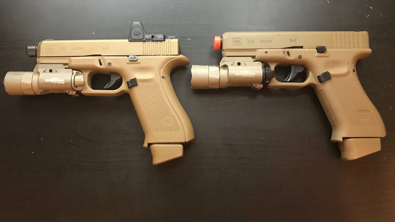 Comparing an airsoft G19x to a real G19x - YouTube