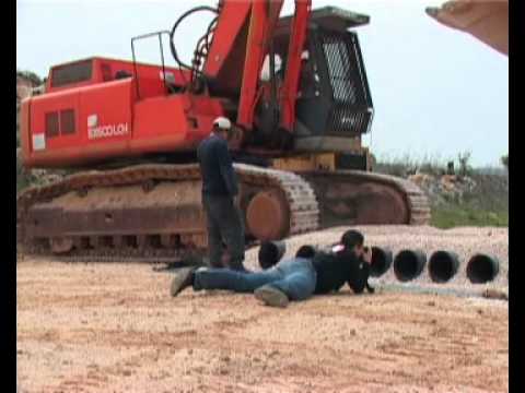 Pexgol pipe under 56 tons shovel.wmv - YouTube