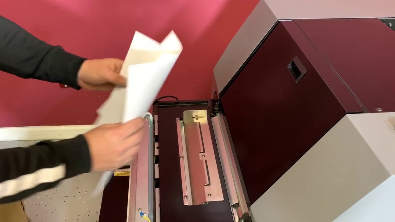 Duplo DSF-2000 Sheet Feeder - YouTube