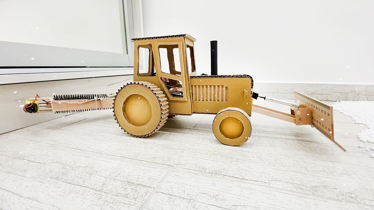 Cardboard DIY tractor snow pusher, and sweeping function at one time ...