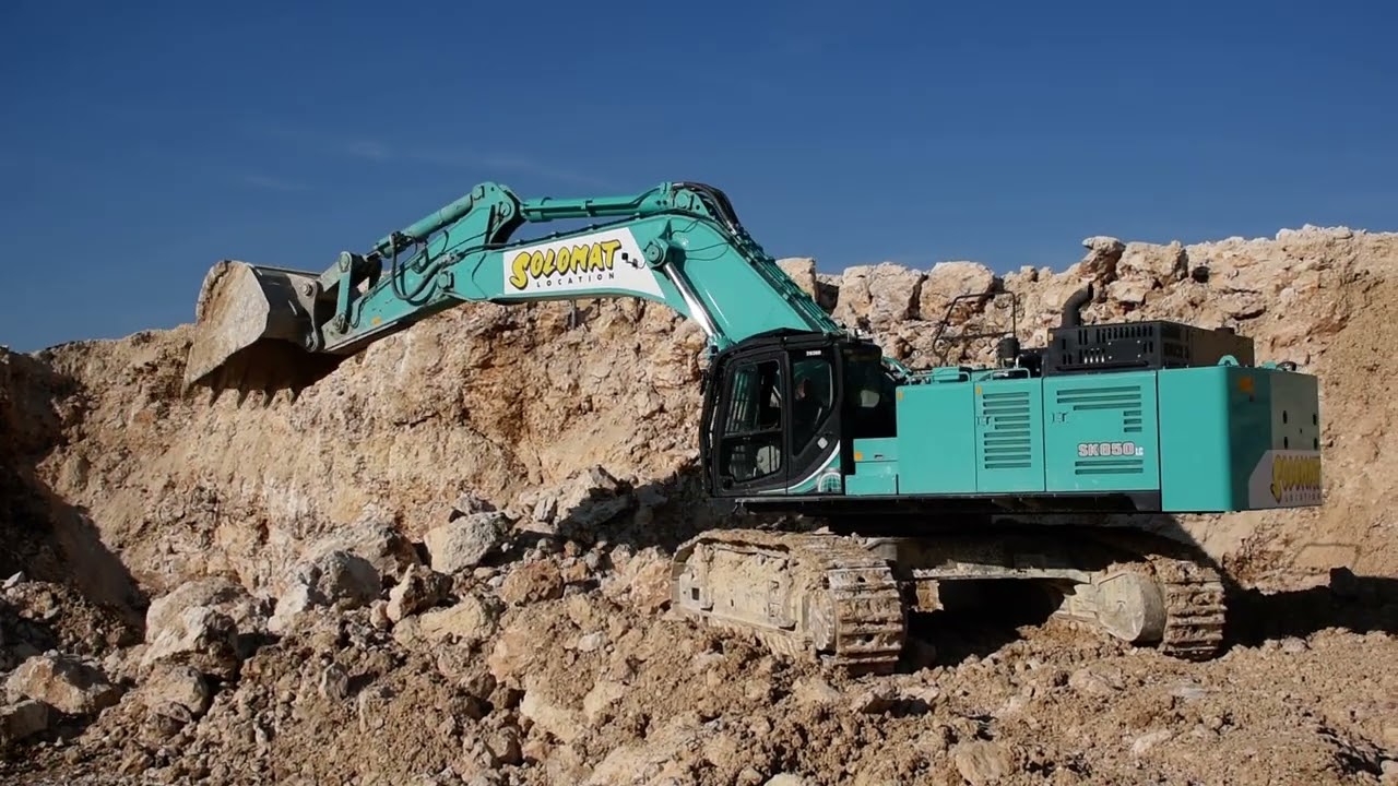 Kobelco SK850-11 loading 730C - Part 1 - YouTube