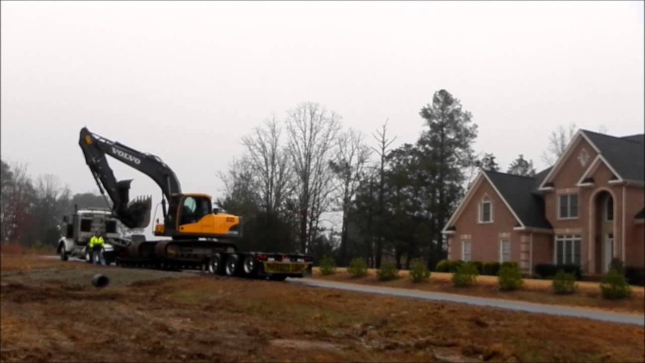 How to Side Load an Excavator - YouTube