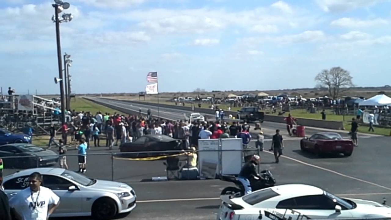 TX2K13 bunch of fast cars running down the street - YouTube