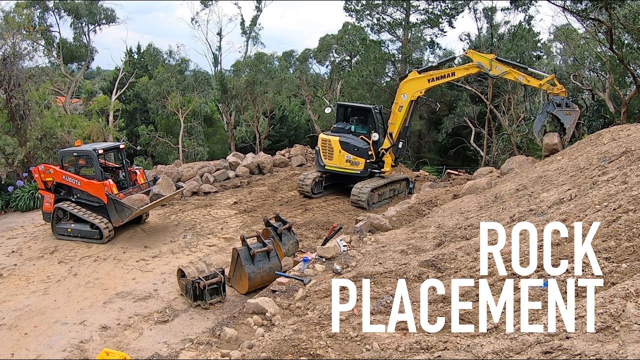 Landscaping/Erosion Control Rock Placement - YouTube