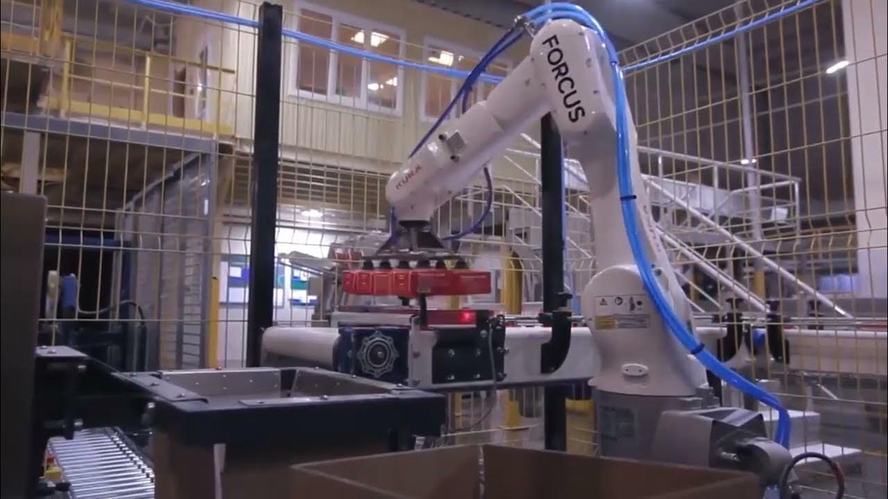 Kuka robotic arm candy packing handing palletizing machine - YouTube