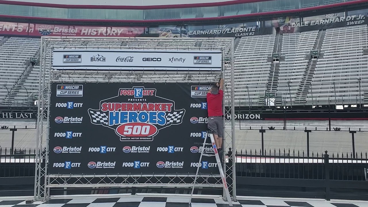 Putting the final touches on the Bristol Motor Speedway victory lane ...