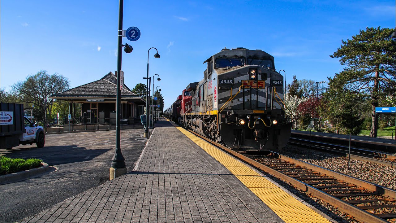 KCSM 4548 (Grey Ghost) hauls CPKC 540 through Deerfield - YouTube