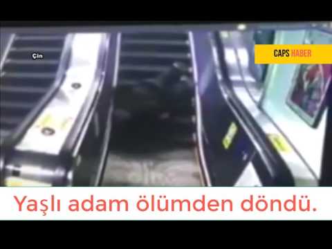 Yaşlı adamın yürüyen merdiven ile imtihanı.
