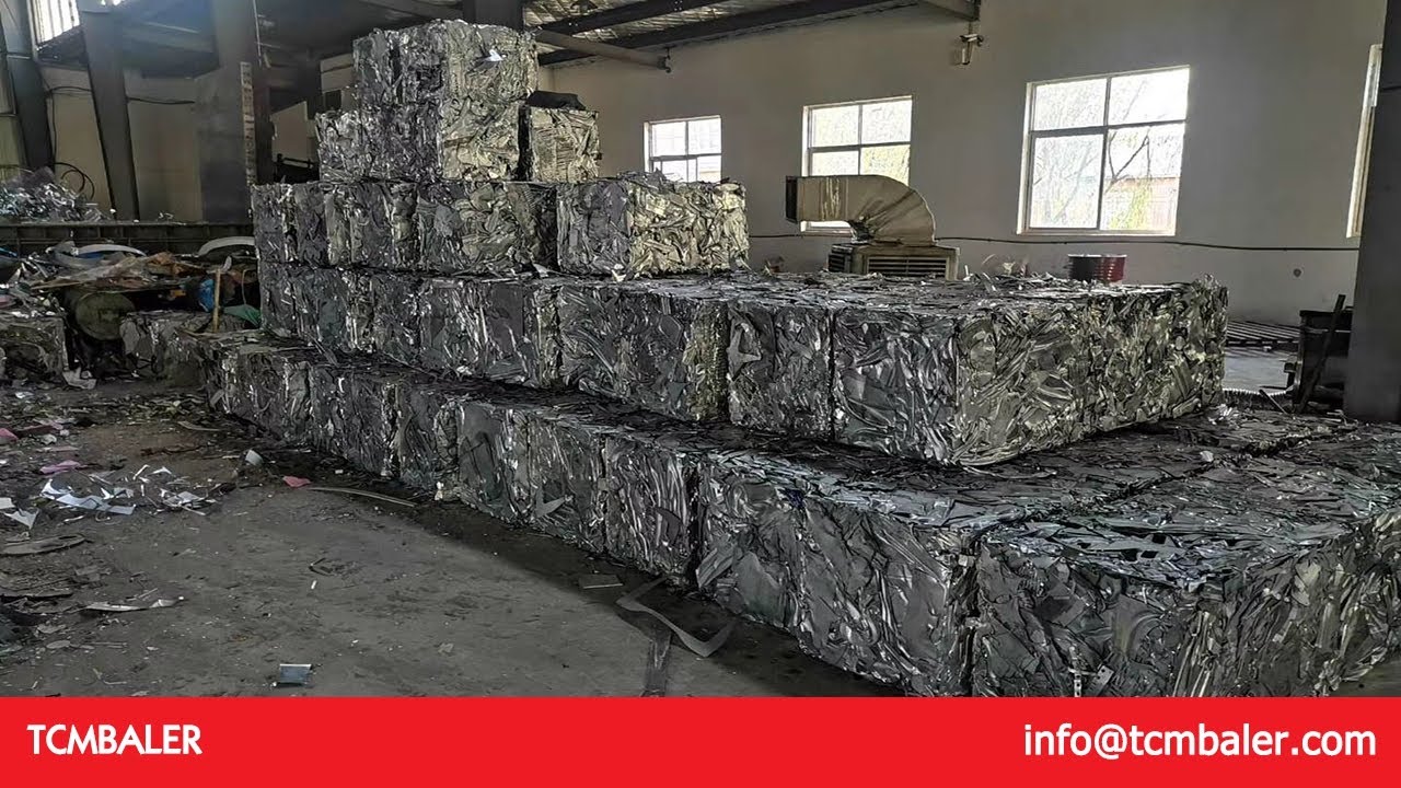 scrap metal bales with excavator - YouTube