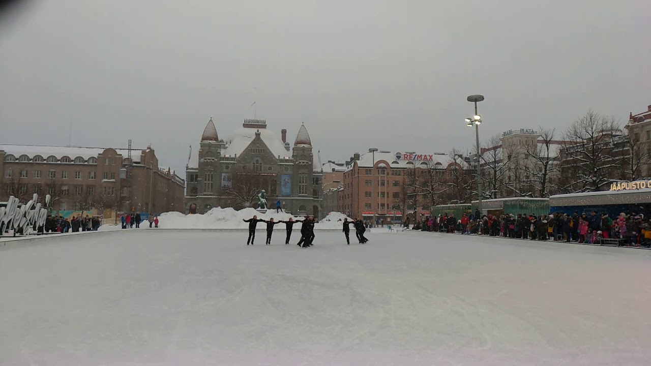 Ice skating besides Helsinki railway station - YouTube