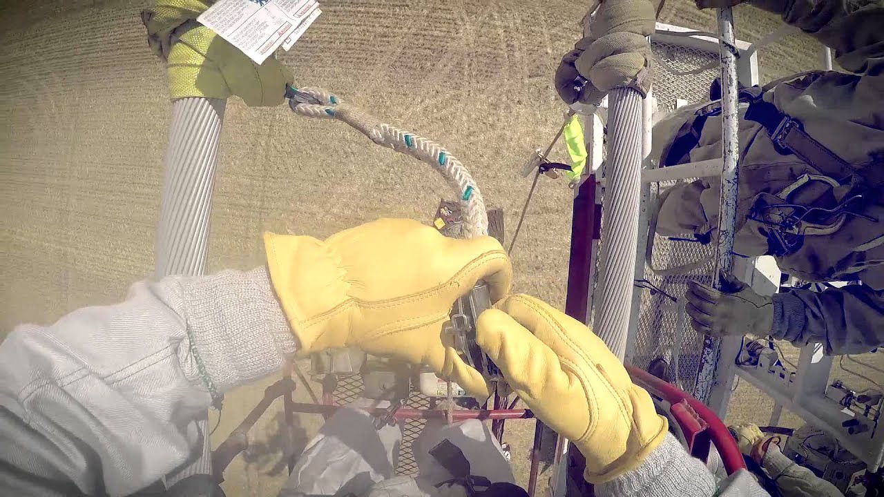 Basin Electric linemen take part in live line training - YouTube