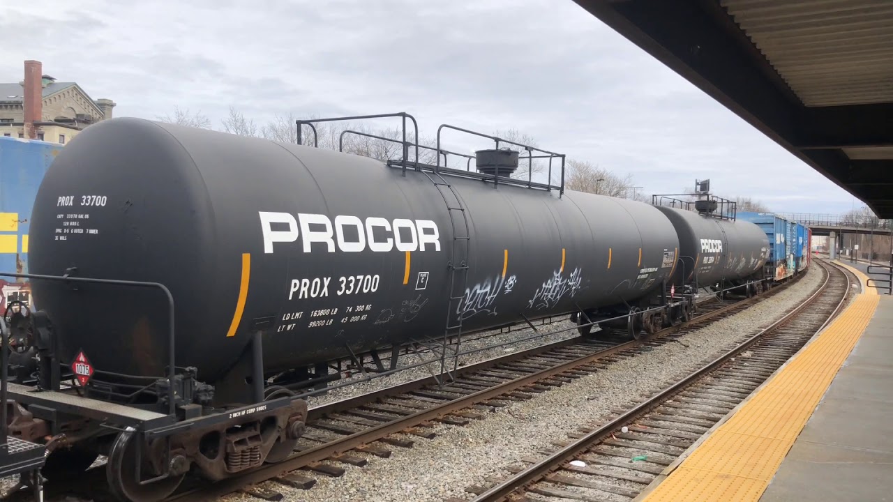 MBTA Commuter Rail Train & Pan Am Railways Freight Train arrives in ...