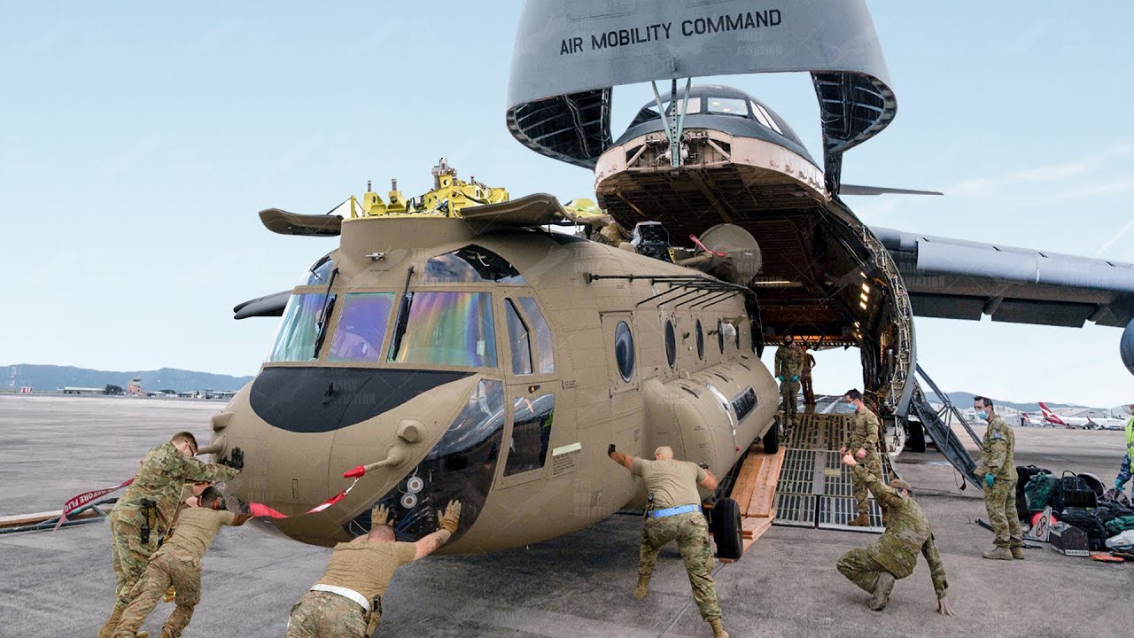 Loading Giant CH-47 Chinook into Largest US Air Force Plane - YouTube