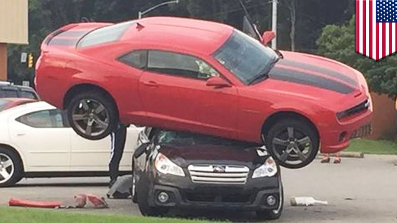 Freak car accidents: Camaro flies up embankment, lands perfectly atop a ...