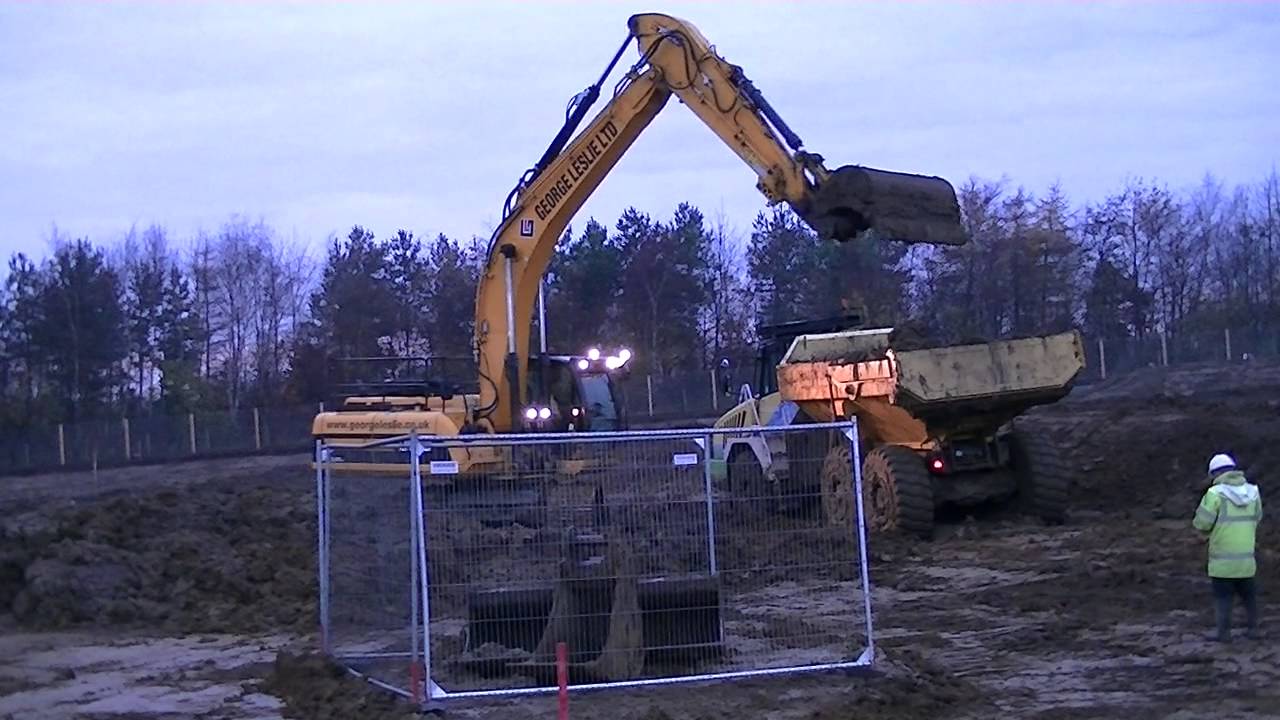 RARE JCB JS 330 Excavator Loading a Terex TA300 With Muck 2 - YouTube