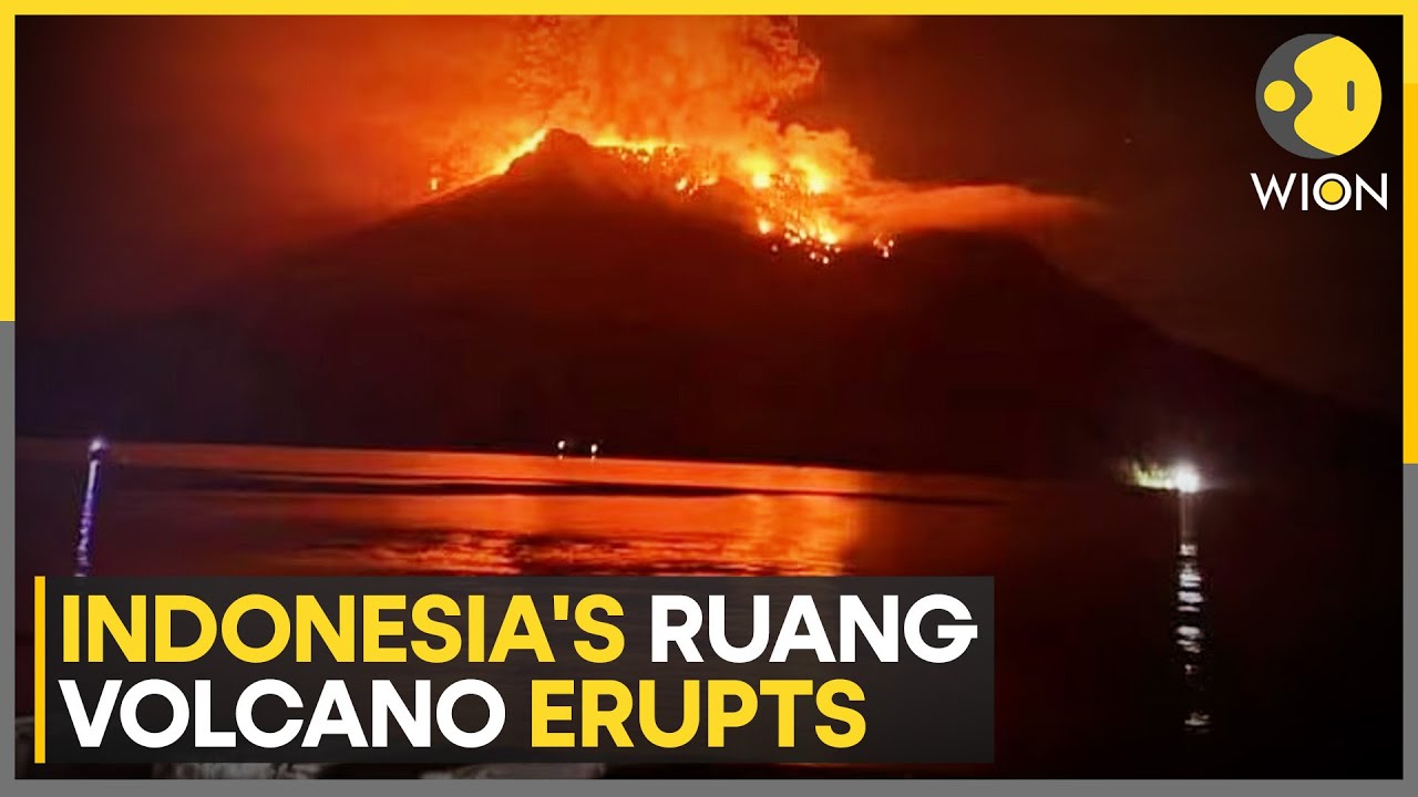 Indonesia’s Mount Ruang volcano erupts again, authorities evacuate over ...