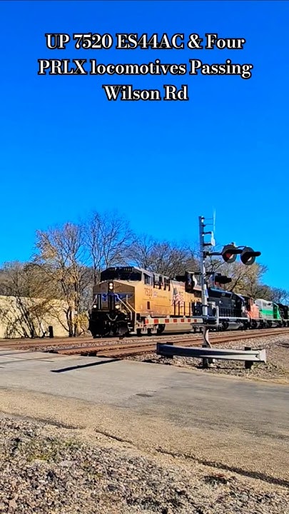 UP 7520 ES44AC & Four PRLX locomotives Passing Wilson Rd - YouTube