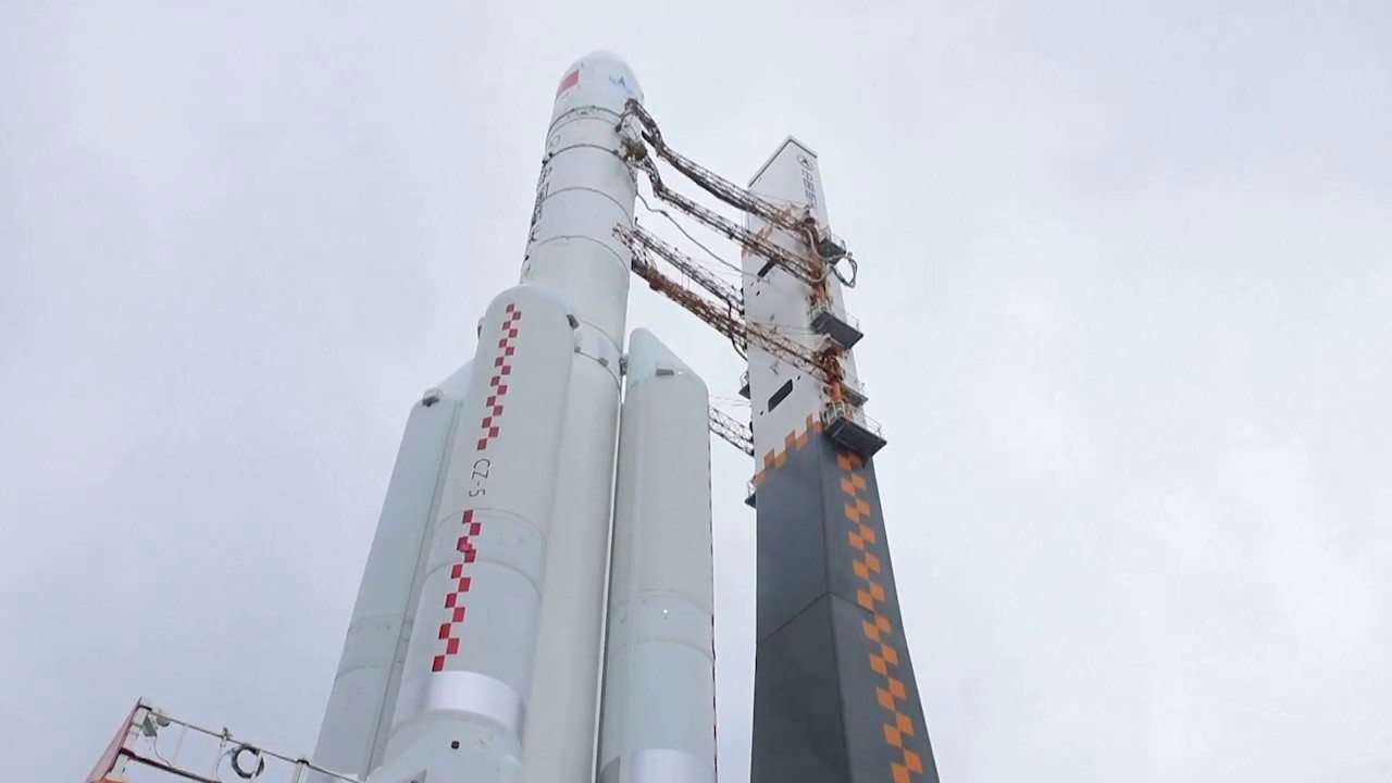 China's Long March-5 Rocket Rolled Out to Launch Site - YouTube