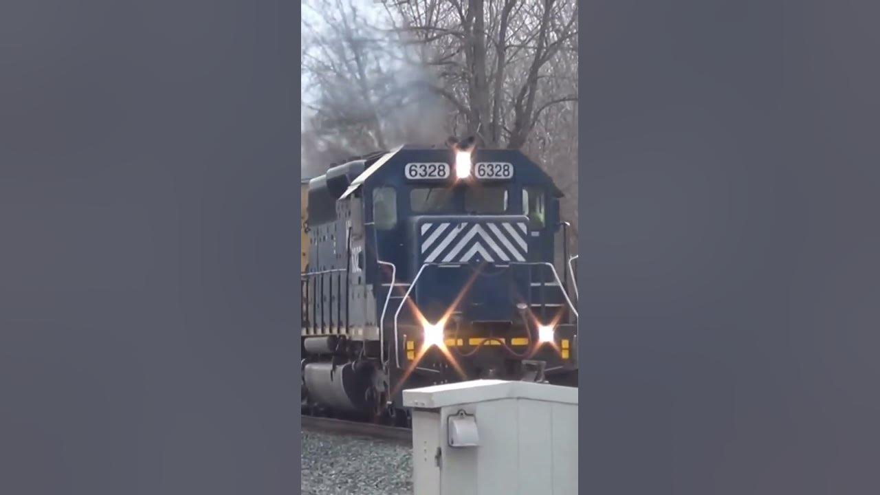 SD40 - 2 Leaser engine hits the horn. - YouTube