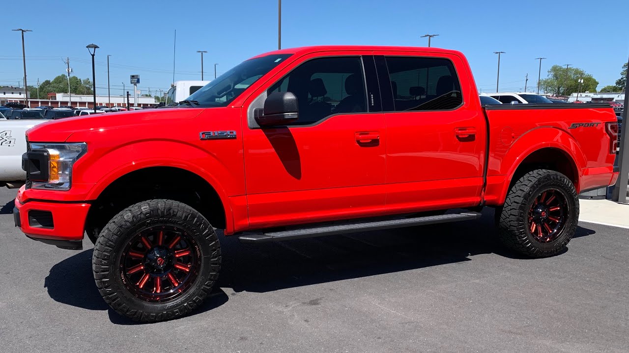 Ford Raptor Lifted Red