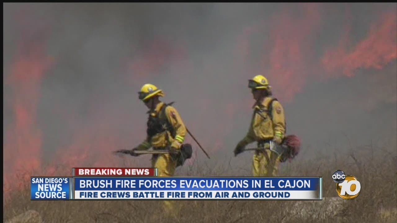 Crews battle brush fire in El Cajon that forced evacuations - YouTube