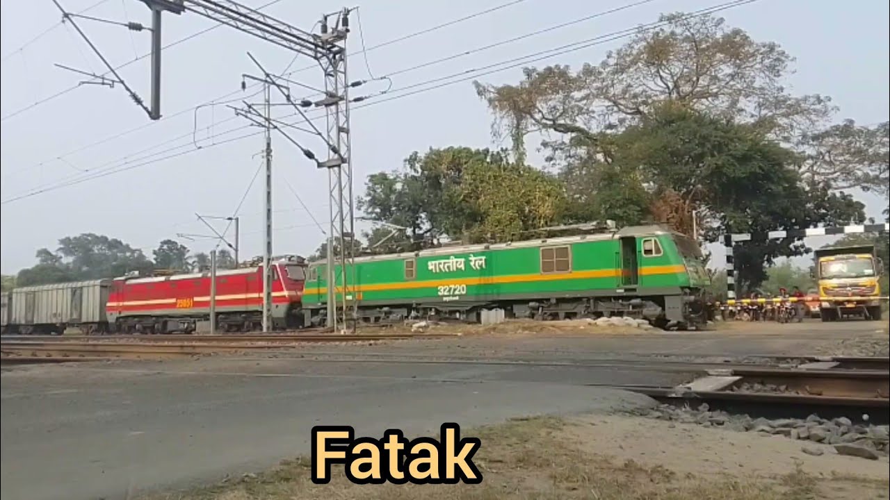 two colourful locomotive crossing railway fatak #railway #train - YouTube