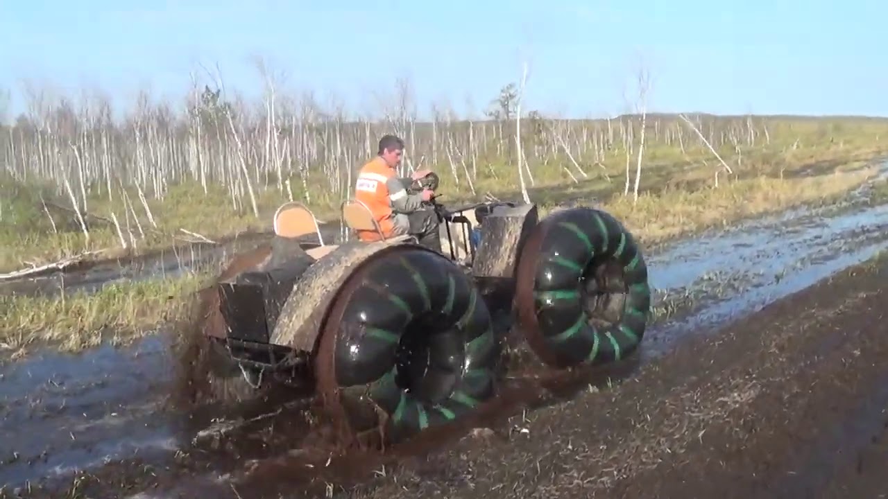 Homemade all terrain vehicle in the swamp. Off-road vehicle. You have ...