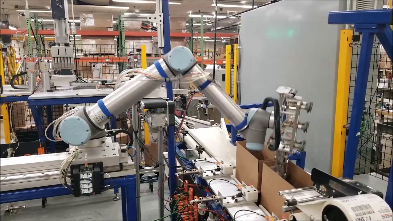 Case Packing with a UR10 - CRUM - YouTube