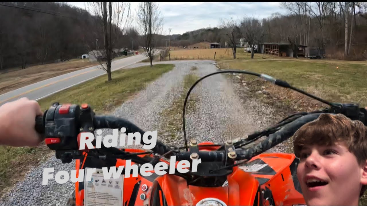 Riding a four wheeler and hitting some jumps - YouTube