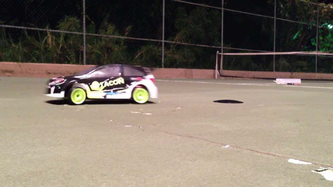 Tacon Rally Car 1/12 drifting with obstacles in a tennis court - YouTube