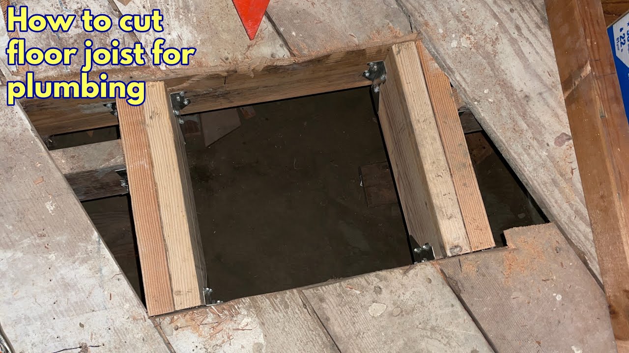 How to cut a floor joist for plumbing requirements - YouTube