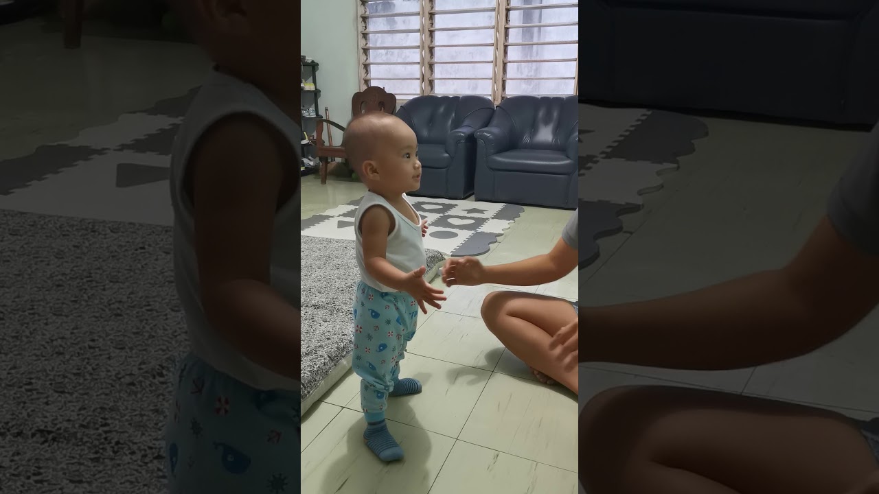 10 Month Old Baby Trying to Stand Still - YouTube