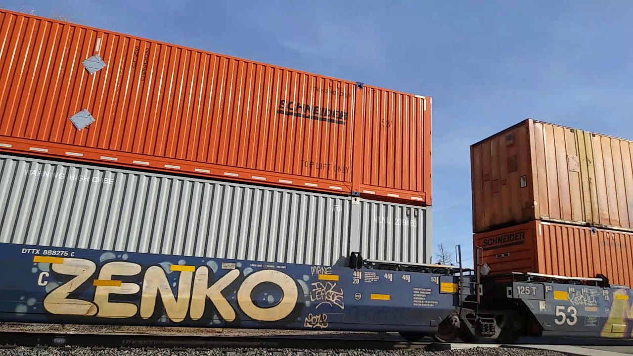 With a friendly crew northbound Q-Train lead by BNSF ES44C4 #6997 ...