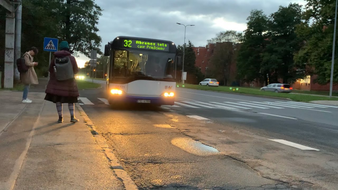 Riga, Latvia bus 32 ride from Kauguru Iela to Nacionālā Bibliotēka ...