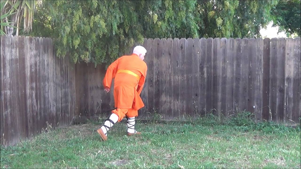 Orange Shaolin Monk Robes and Whip - YouTube