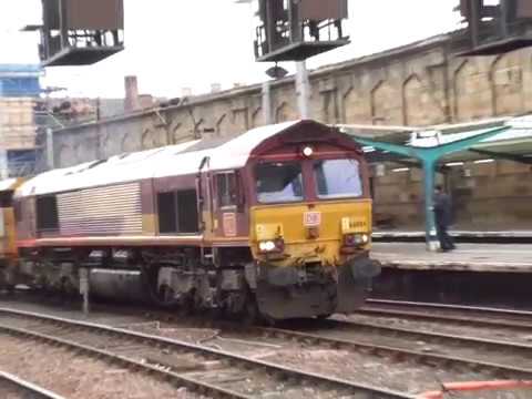 The Class 66 DB Cargo UK (EWS) No.66084 went through at Station Siding ...