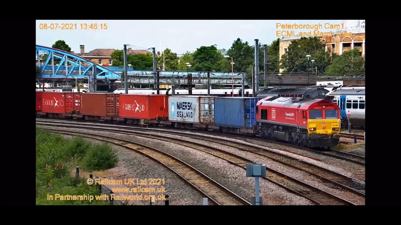 DB Cargo class 66085 arriving, idling & departing Peterborough cams ...