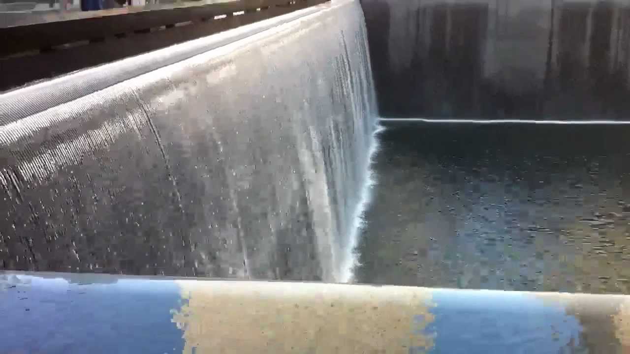 ground zero memorial waterfalls and new trade center - YouTube