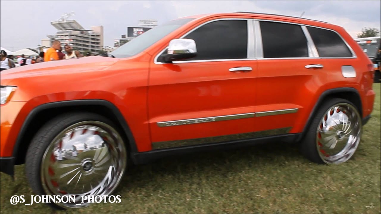 Candy orange Jeep Laredo on 28 inch Dub Wheels in HD - YouTube