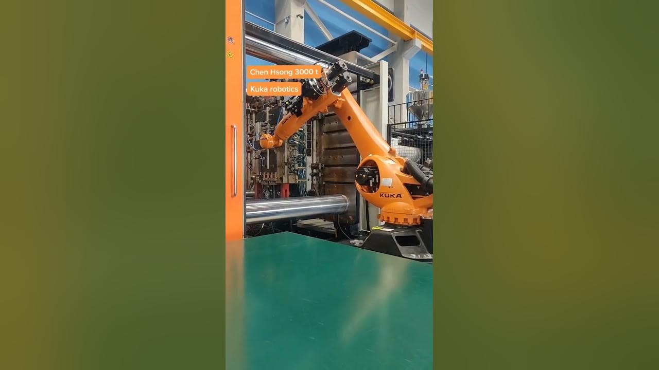 injection molding machine with kuka robot - YouTube