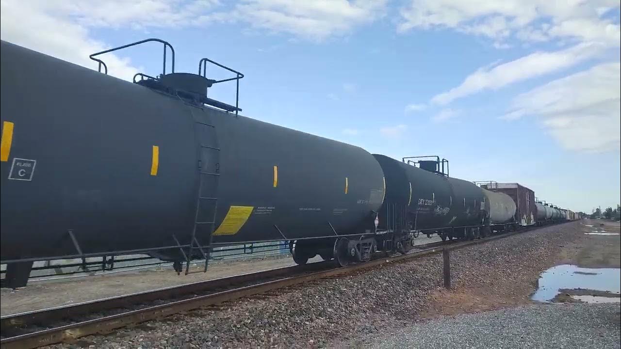 BNSF H BARSTO1 12A with PNWR 3006 trailing passing by N West Ave in my hometown of Fresno, CA in ...