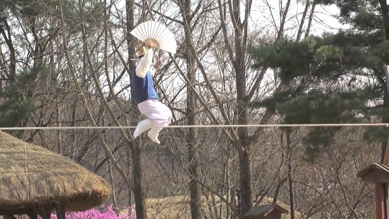 Tightrope Acrobat - YouTube