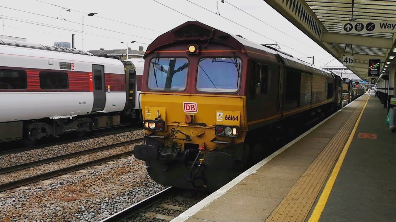 DB EWS Class 66 (66164) powering out of Peterborough pulling the Rail ...