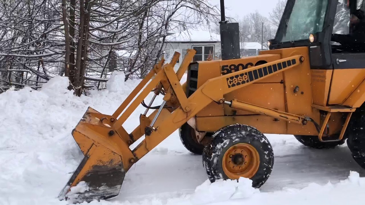 Snowplowing With The Backhoe - YouTube