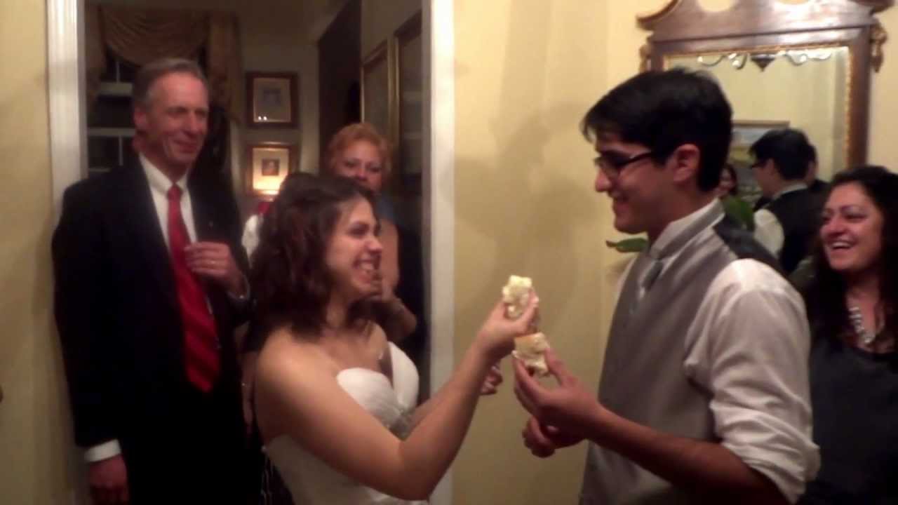 Bride and groom cake eating - YouTube